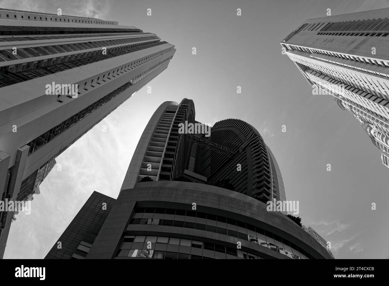 A dramatic upward perspective of modern skyscrapers, showcasing ...