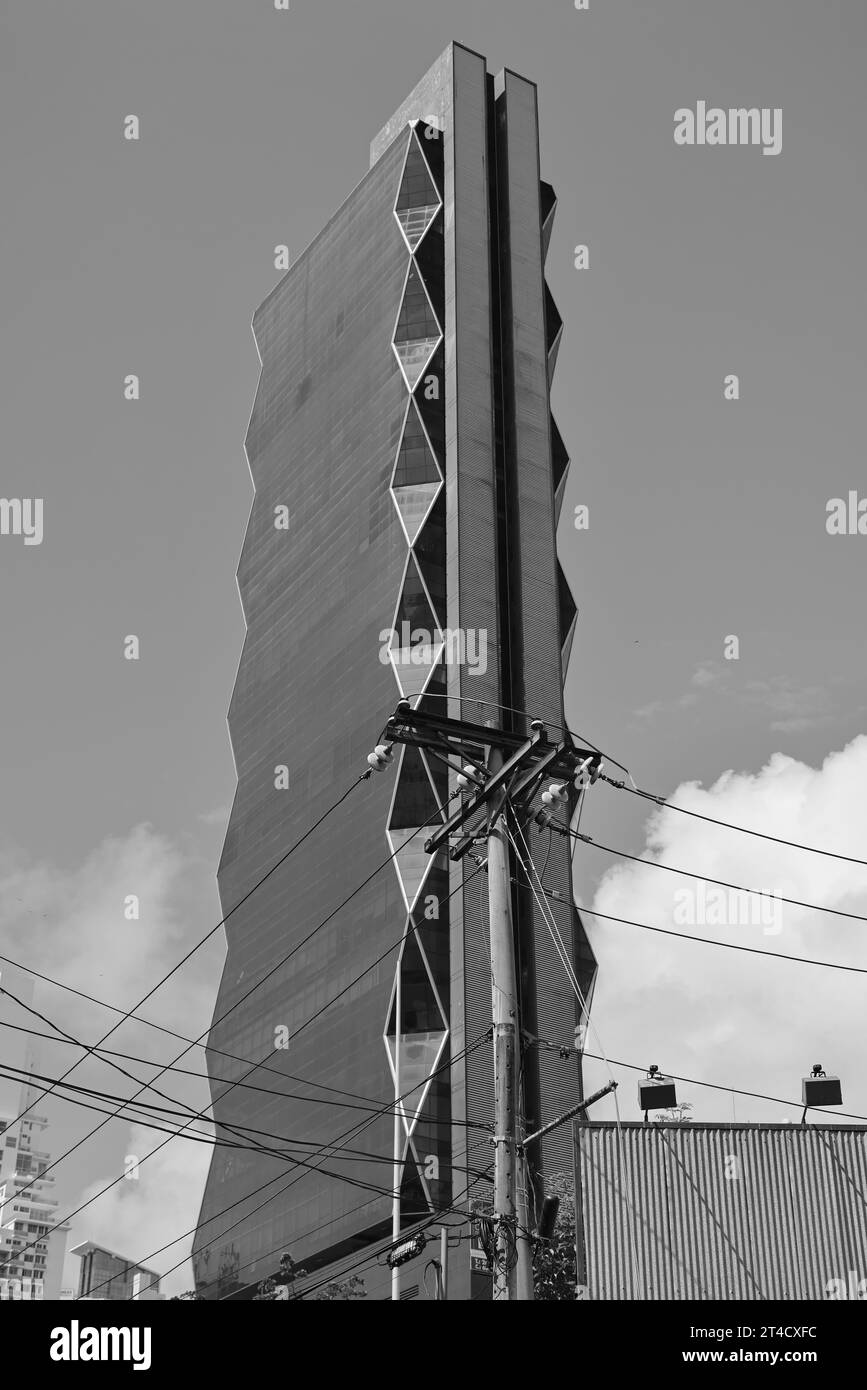 A monochromatic capture of a sleek modern building juxtaposed against ...