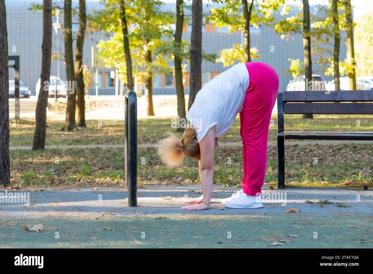 A woman doing gymnastics outdoors Stock Photo - Alamy