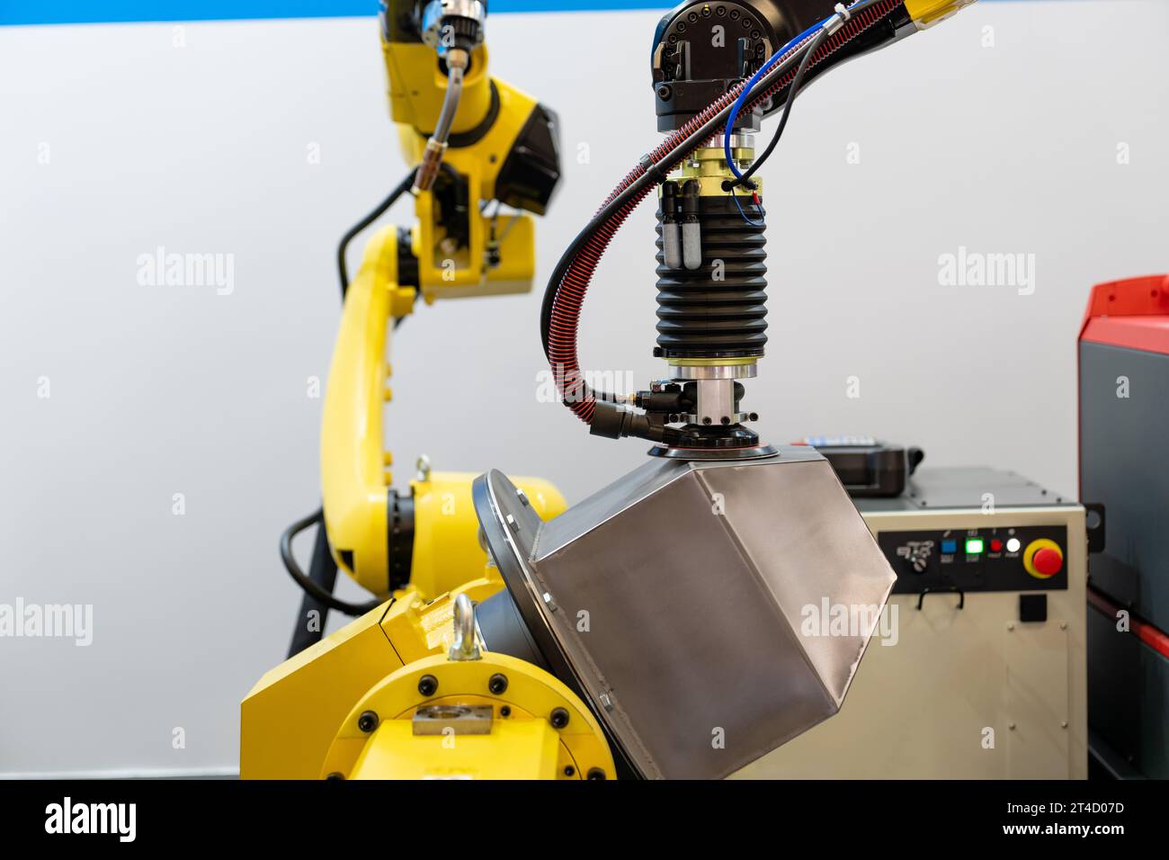 Automatic welding robot in a modern factory in operation Stock Photo ...