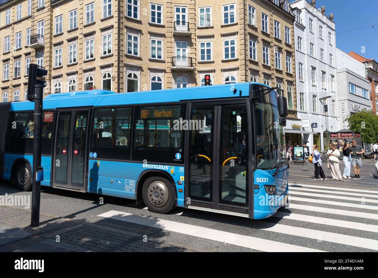 Cityscape with passing people and buildings. Street of the old Danish ...