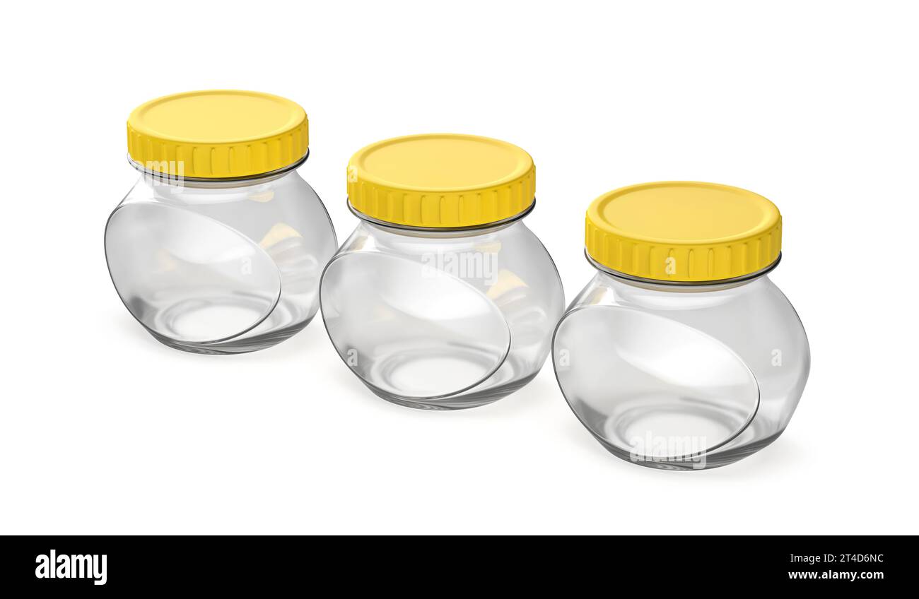 Three empty oval glass jars with yellow plastic lids on white ...