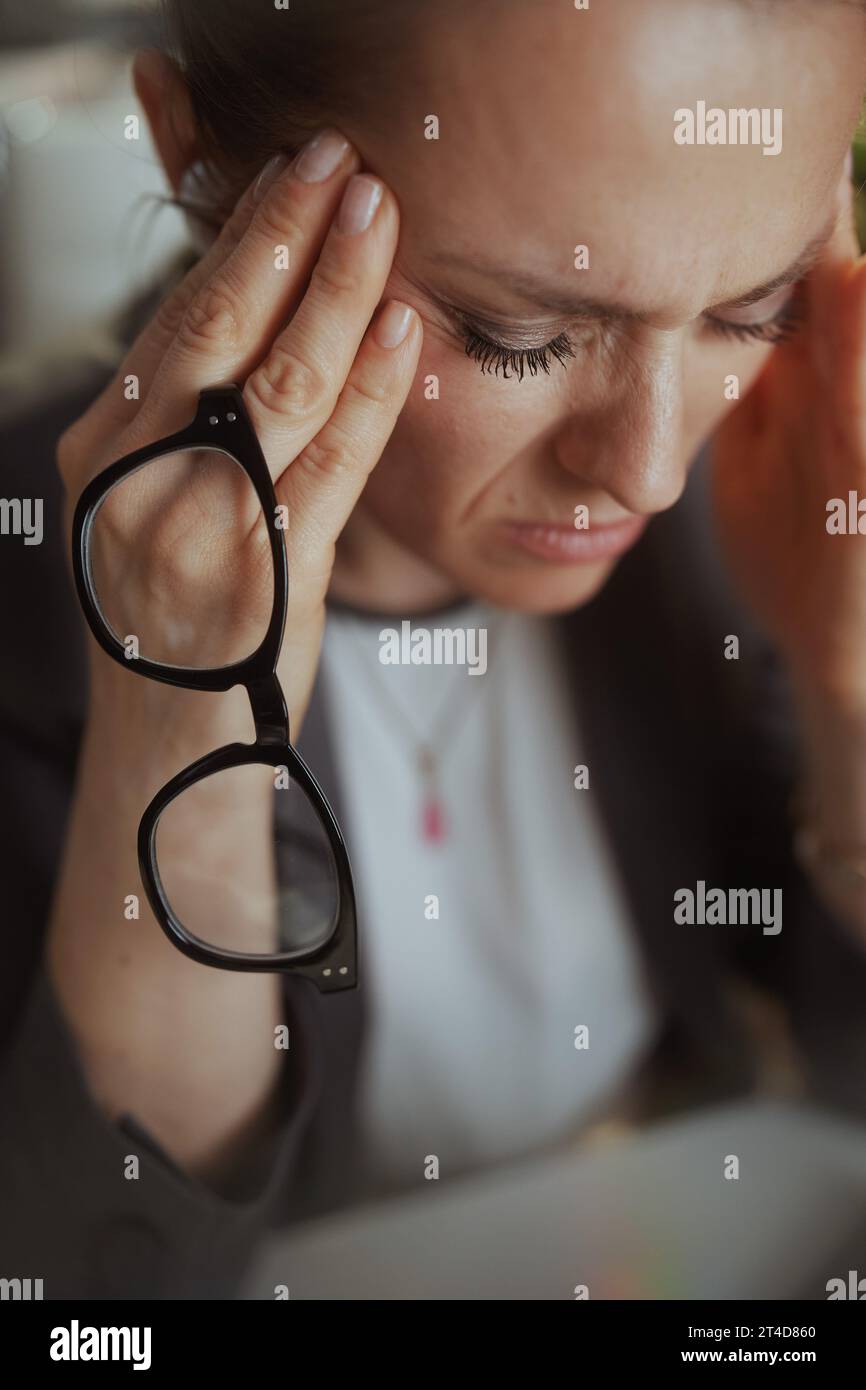 Sustainable workplace. stressed modern business woman at work with ...