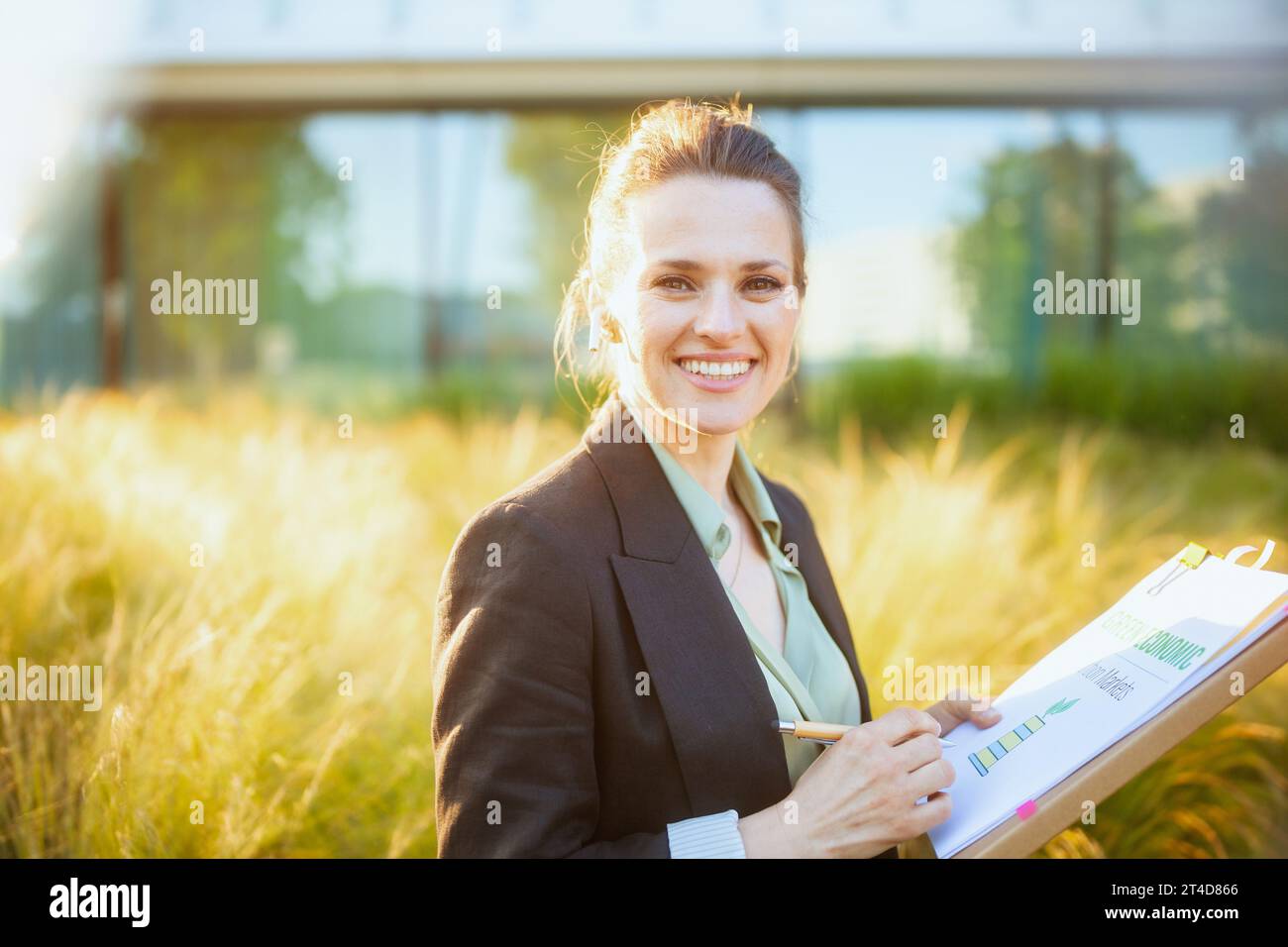 smiling modern 40 years old woman employee near business center in ...