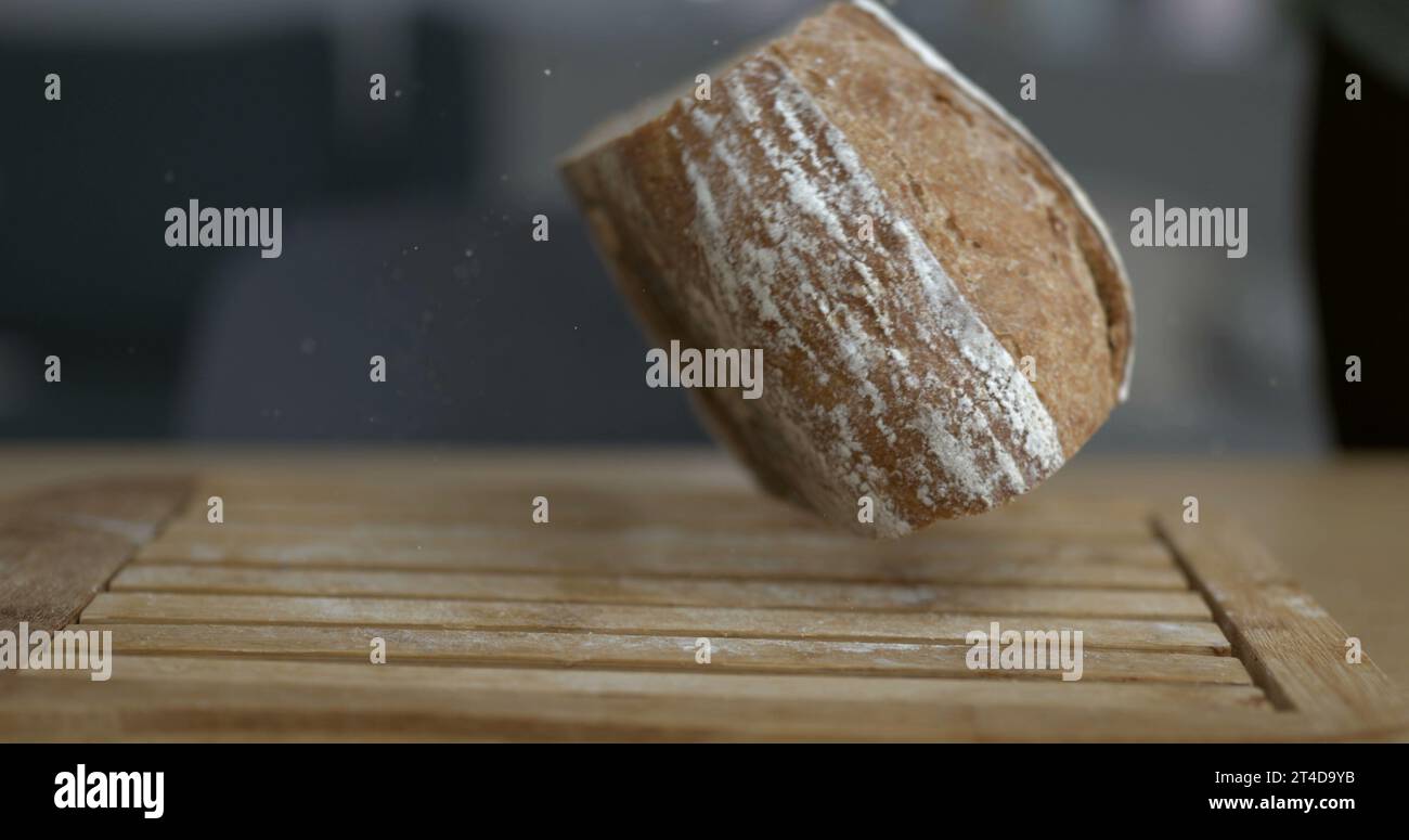 Rustic Tumble Fall of Bread Amidst Flour and Crumbs Stock Photo - Alamy