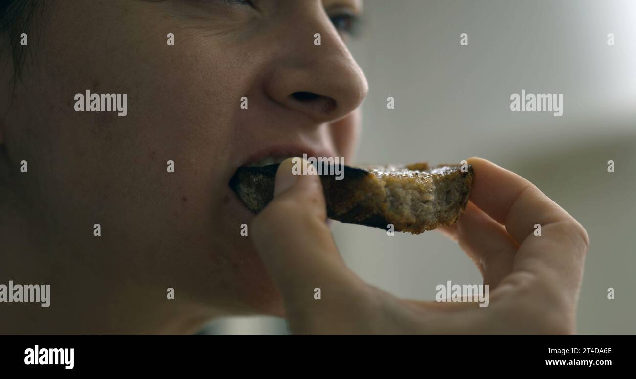 Bread Bliss - Woman Delicate Bite into Toast in Ultra Slow-motion Stock ...