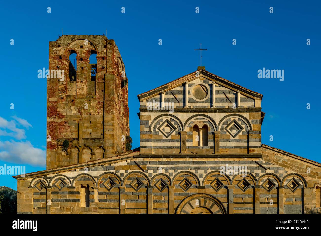 The facade of the ancient parish church of Santi Giovanni ed Ermolao in ...