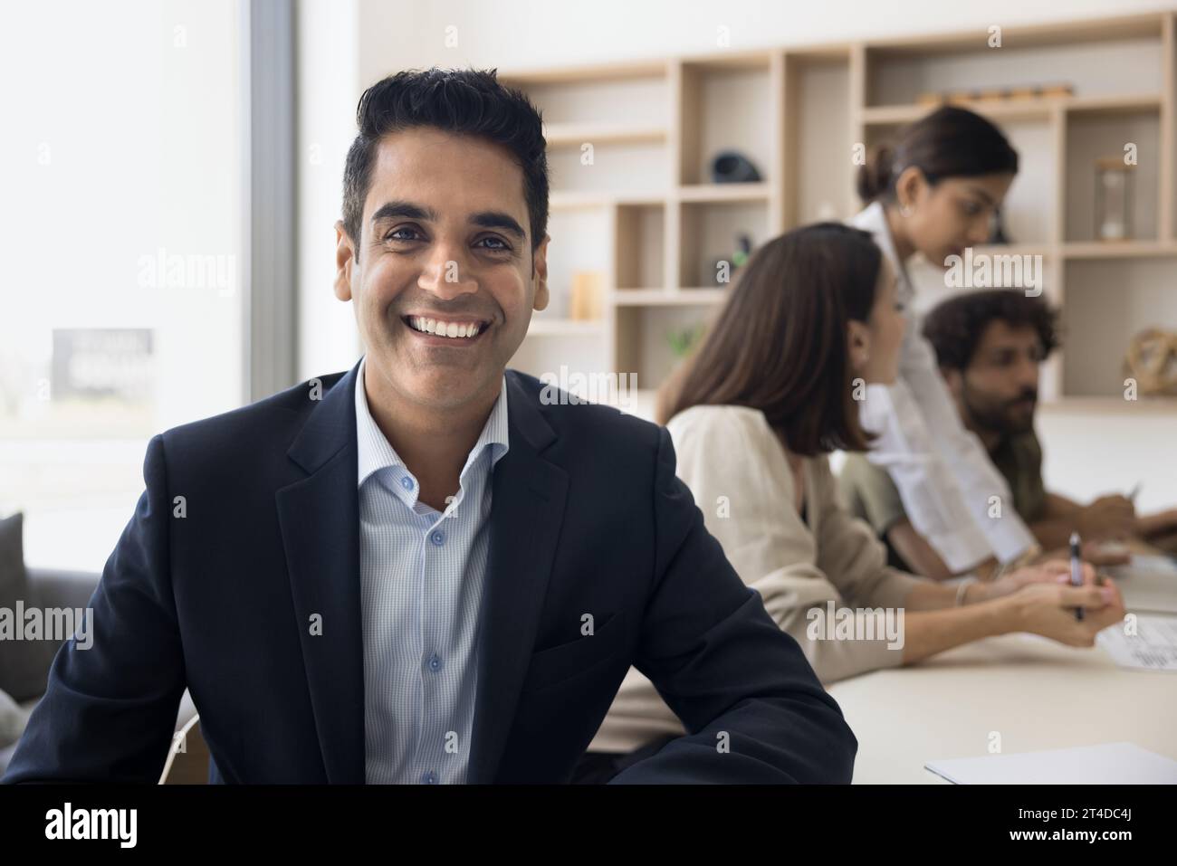 Cheerful handsome mature Indian business leader man professional ...