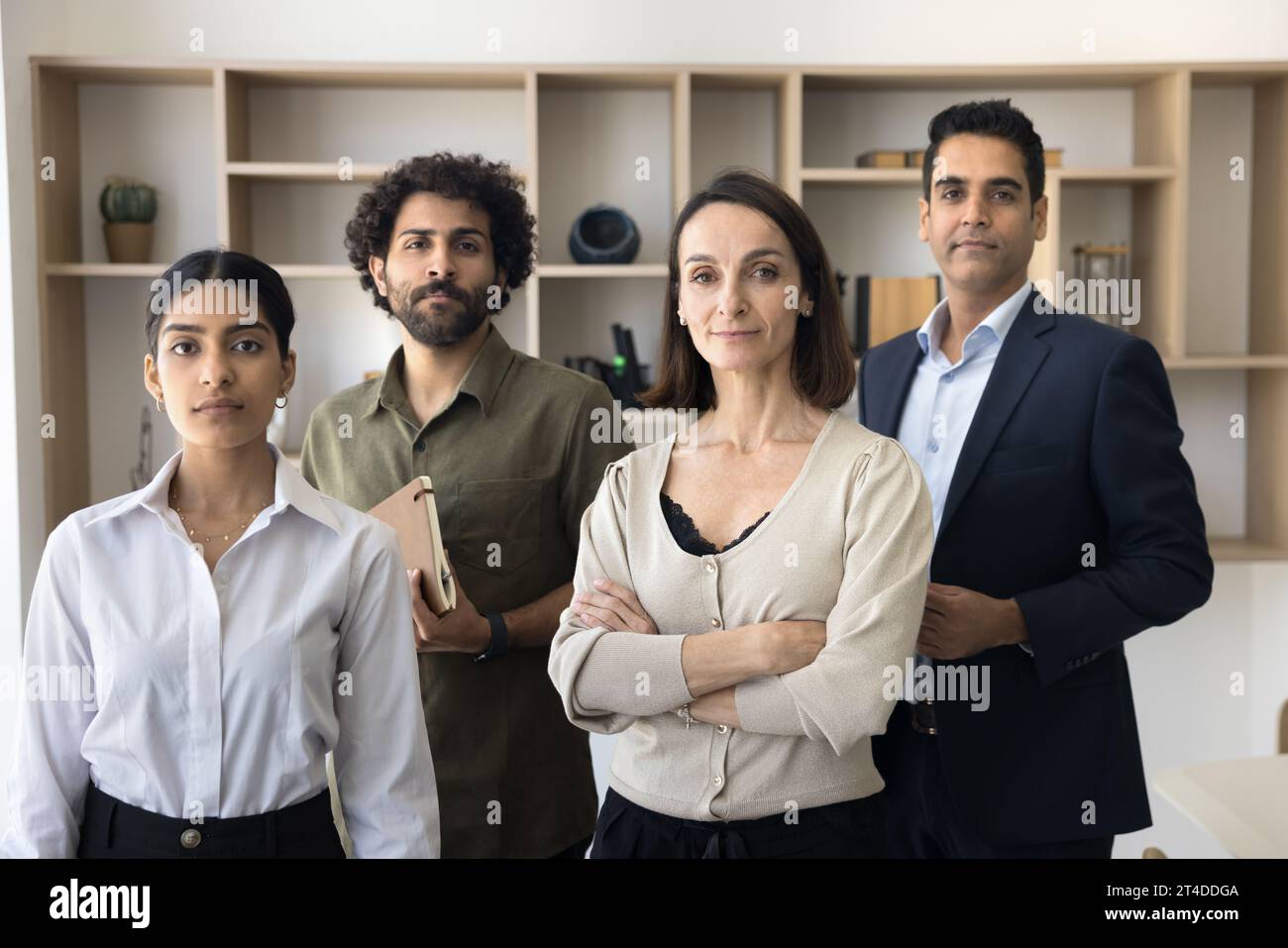 Confident diverse business team and mature Latin leader woman Stock ...