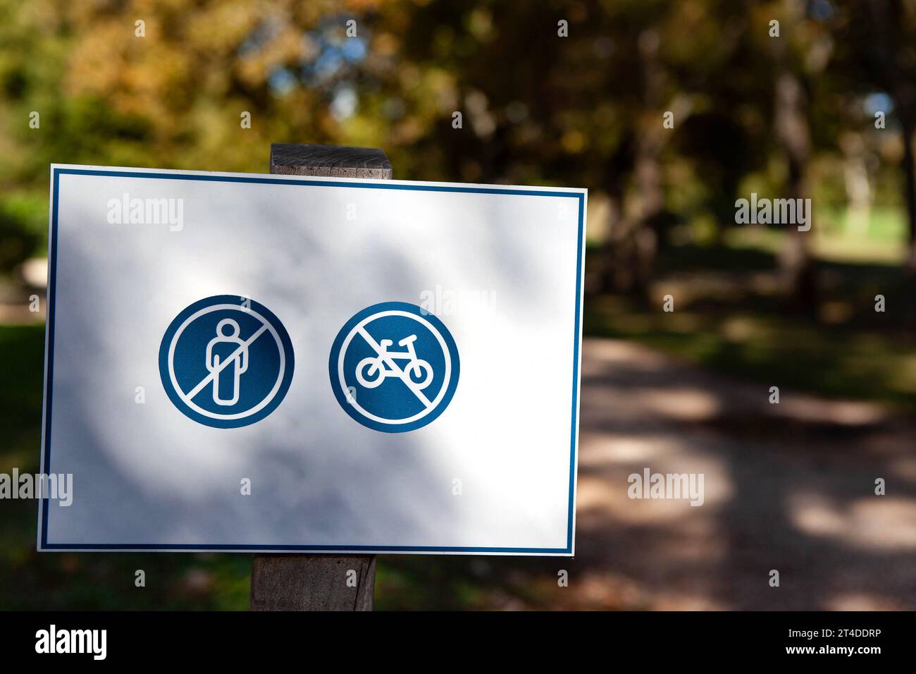 Walk signs on a white panel Stock Photo - Alamy