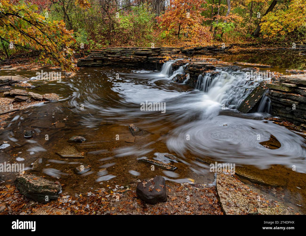 The water of Sawmill Creek flows over the very natural looking man made ...