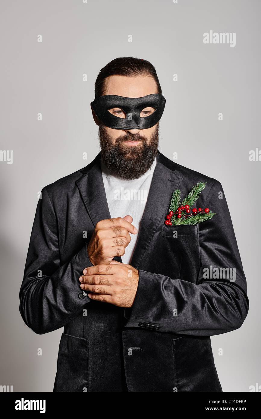 Christmas Masquerade ball, handsome bearded man in carnival mask and ...