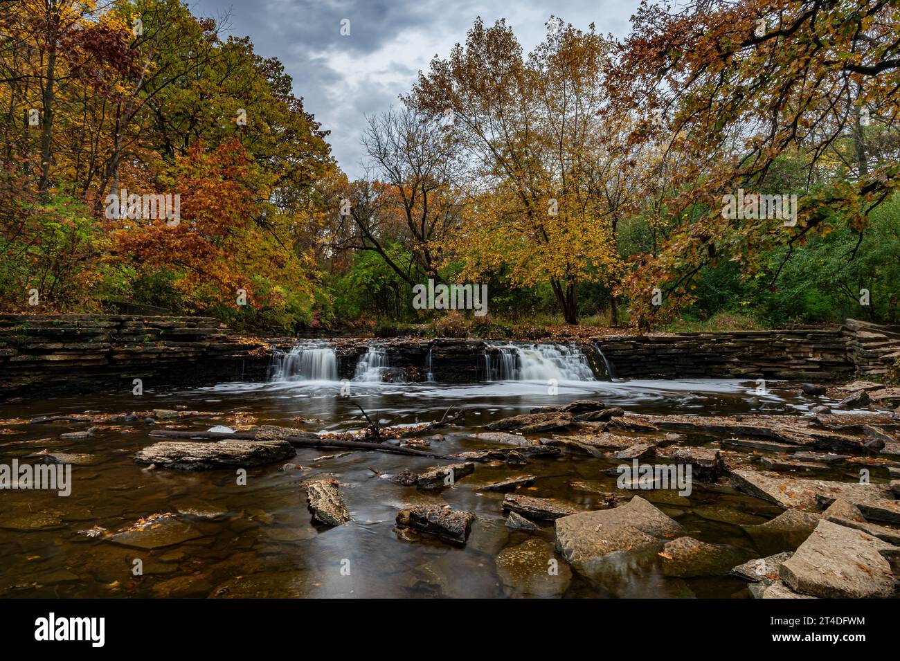 The water of Sawmill Creek flows over the very natural looking man made ...