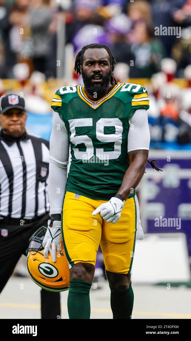 Green Bay Packers linebacker De'Vondre Campbell (59) walks on the field ...