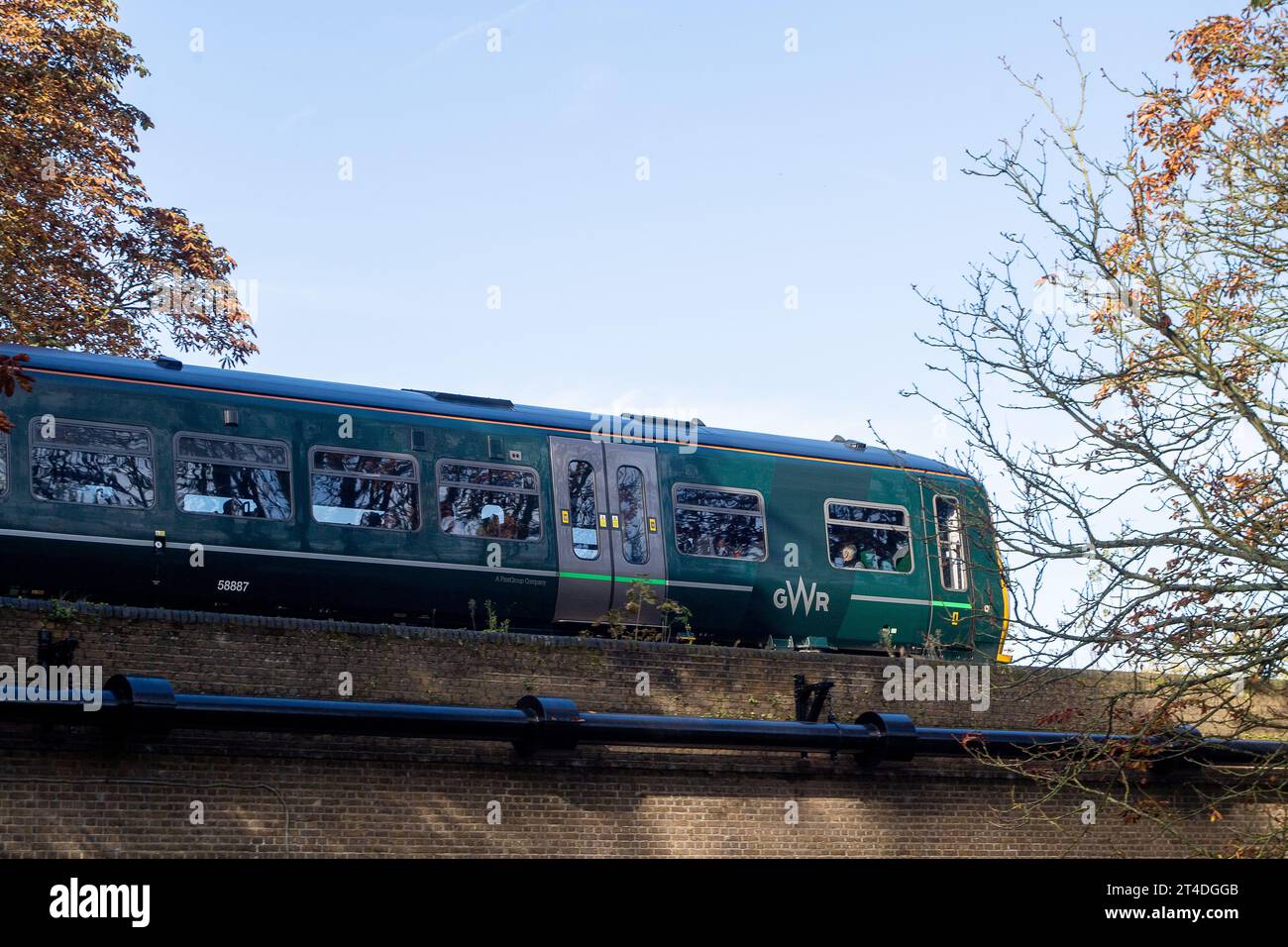 Windsor, Berkshire, UK. 30th October, 2023. A GWR train crosses the ...