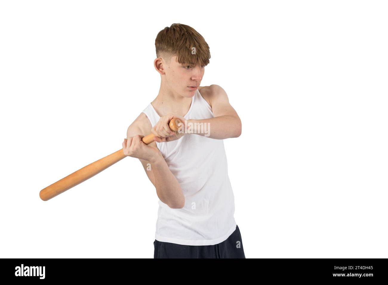 A caucasian teeanage boy holding baseball bat about to swing Stock ...