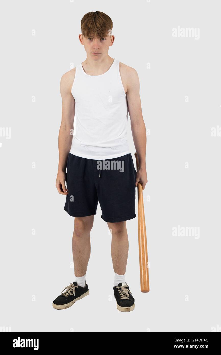 A caucasian teeanage boy holding baseball bat Stock Photo - Alamy
