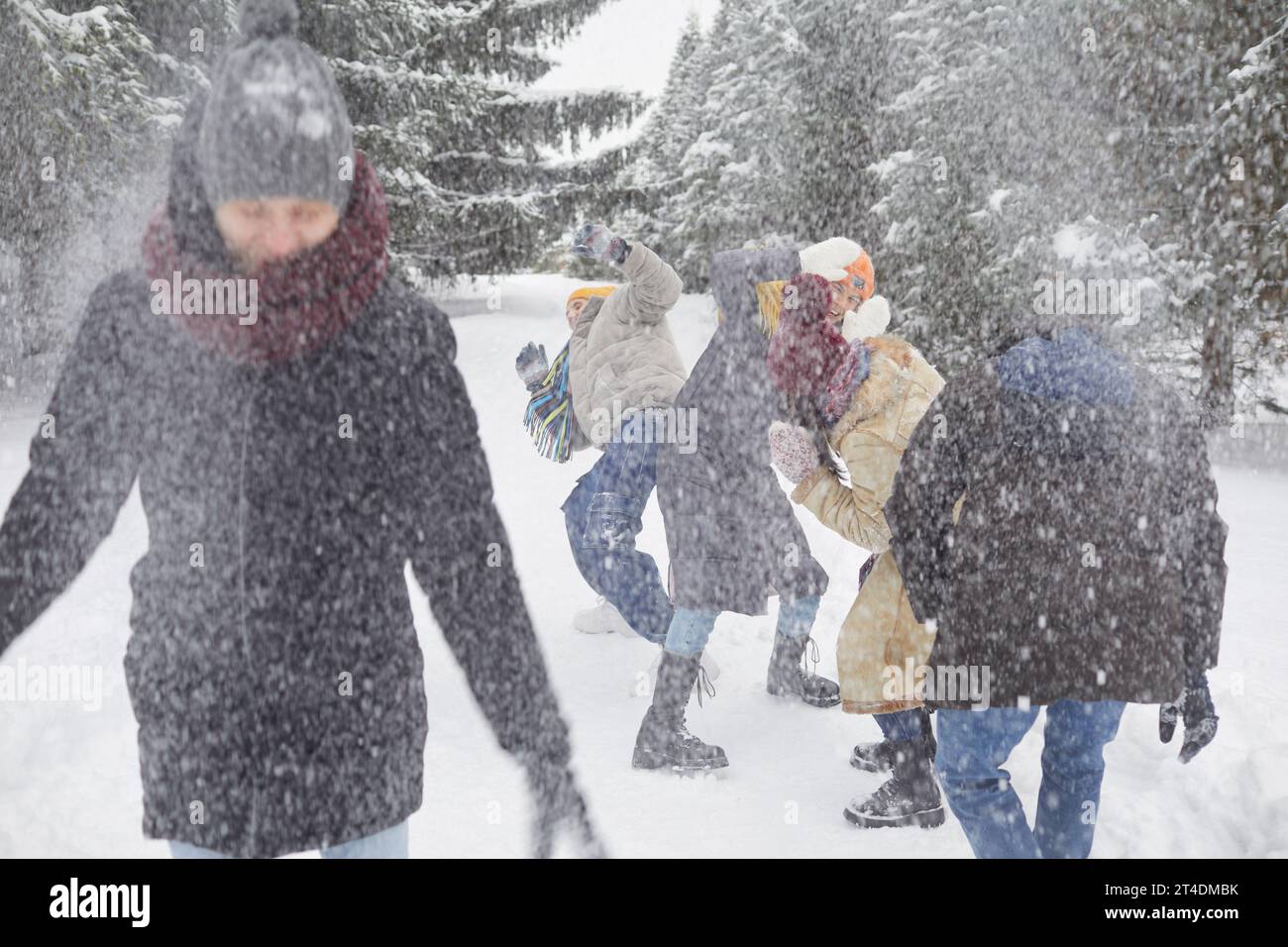 Group friends enjoying warm hi-res stock photography and images - Alamy