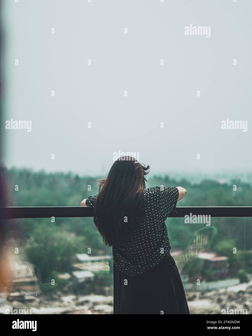 girl enjoying the view at rooftop cafe in rishikesh, india Stock Photo ...