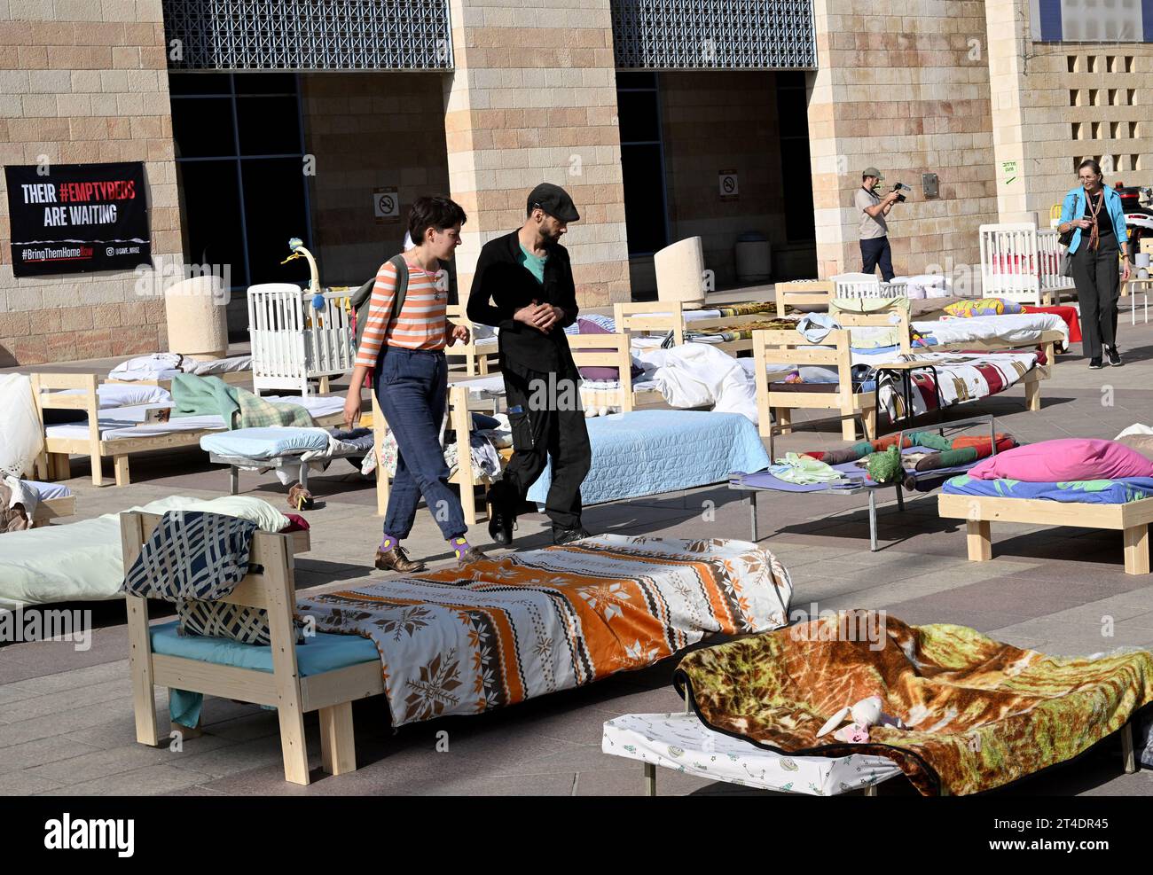 Jerusalem, Israel. 30th Oct, 2023. People view an installation called ...
