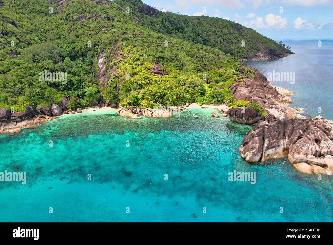 Drone shot of Anse du riz, rice beach beach, transparent sea, lush ...