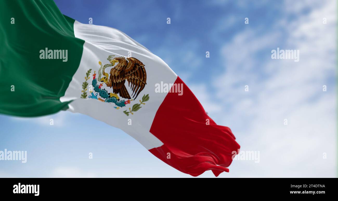 Mexico national flag waving on a clear day. Tricolor of green, white ...