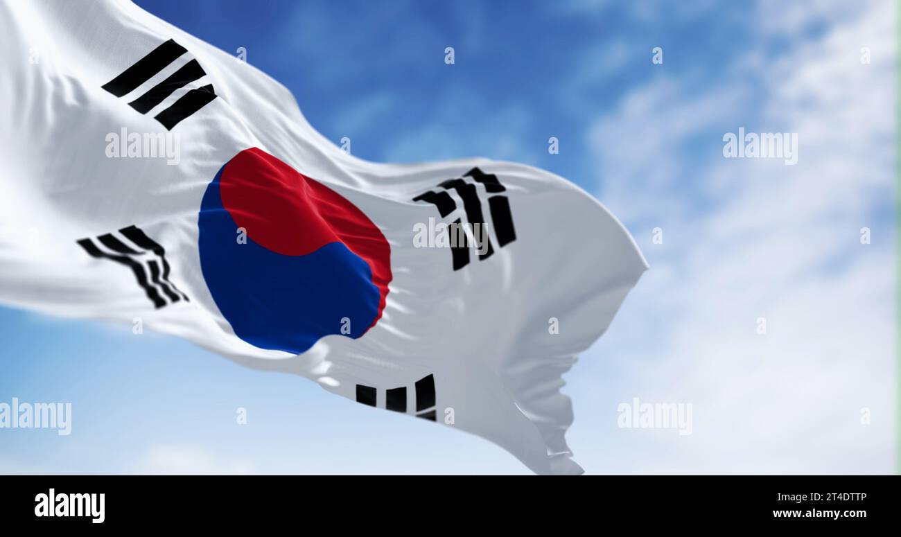Close-up of national flag of South Korea waving on a clear day. White ...