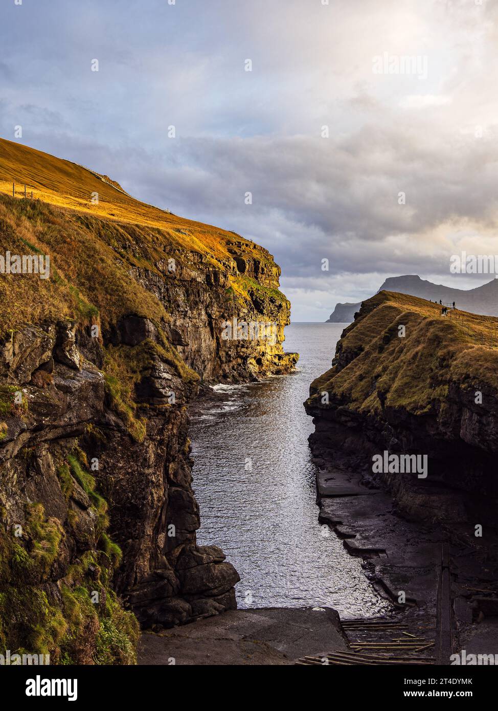 Rock crevice near the village of Gjogv on the Faroe Island of Eysturoy ...