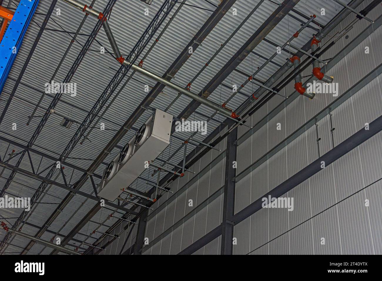 An evaporator high up near the ceiling in the freezer of a CO2 cold ...