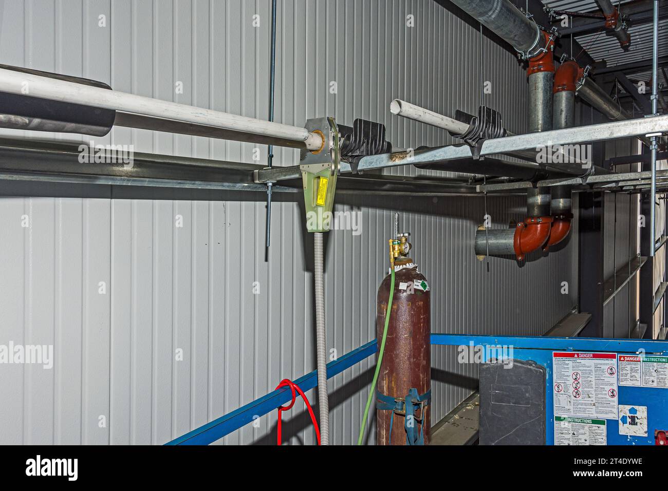 An electronic tool is automatically welding two pieces of pipe together ...