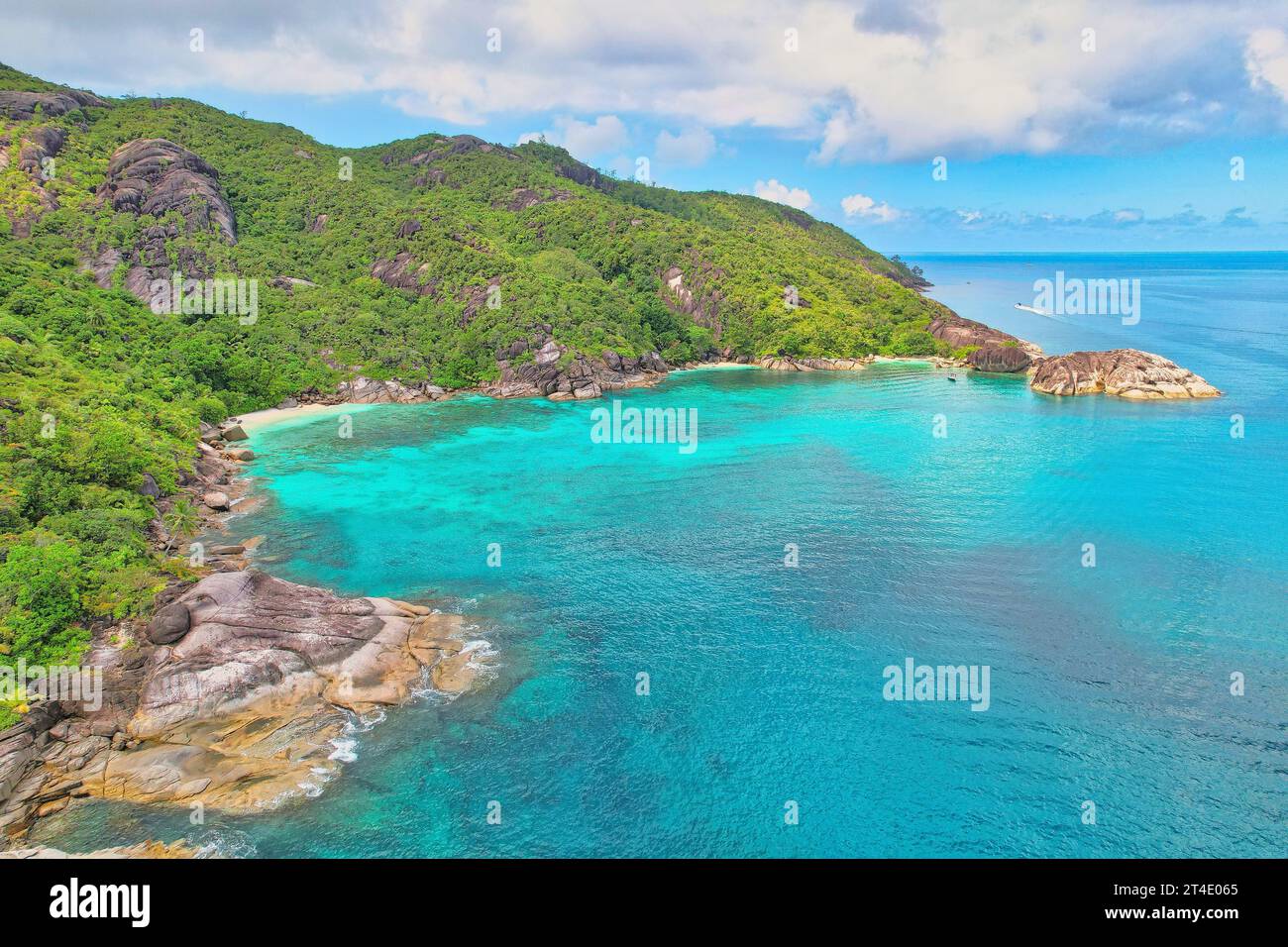 Drone shot of Anse du riz, rice beach beach, transparent sea, lush ...