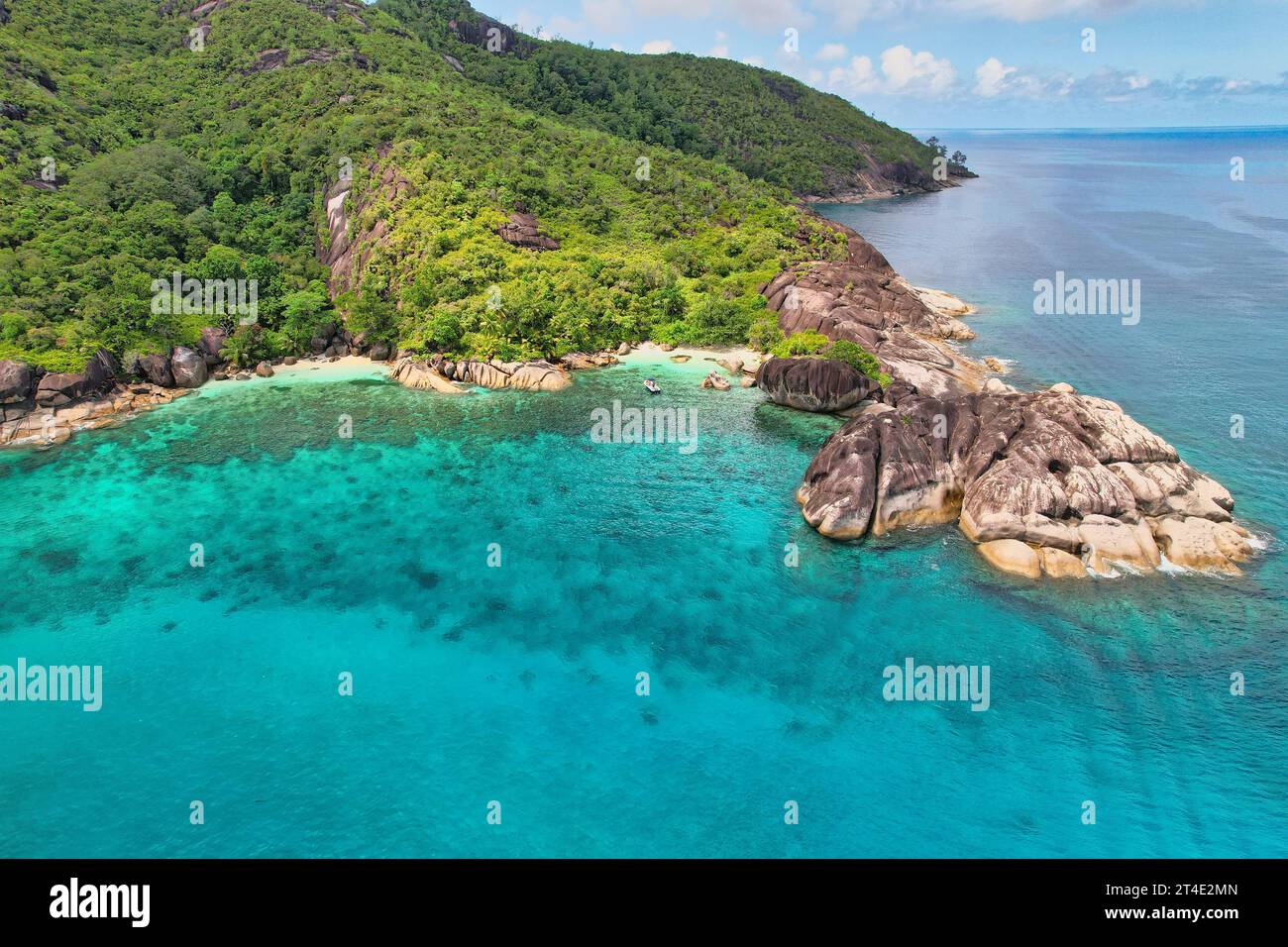 Drone shot of Anse du riz, rice beach beach, transparent sea, lush ...
