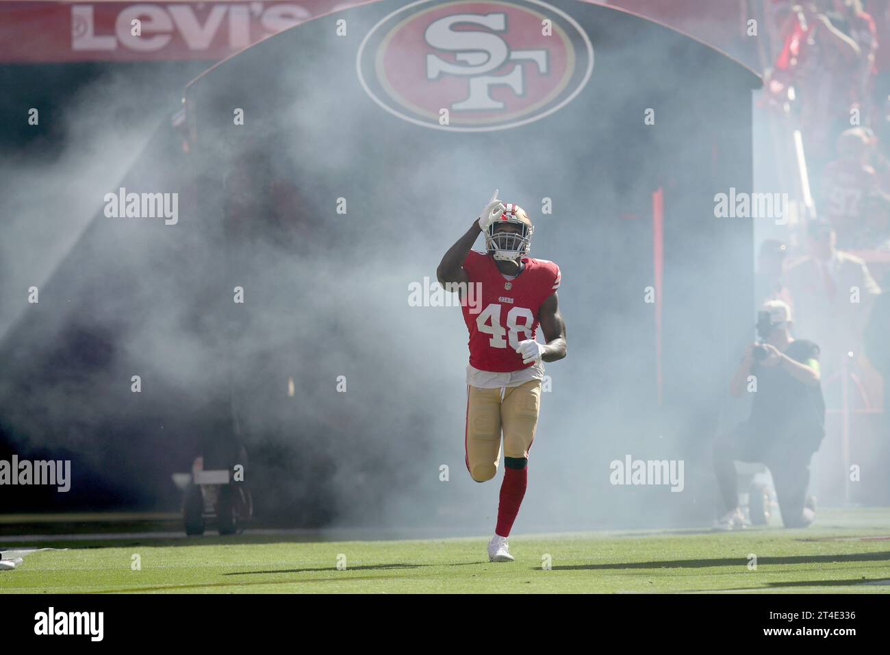 San Francisco 49ers linebacker Oren Burks (48) runs onto the field ...