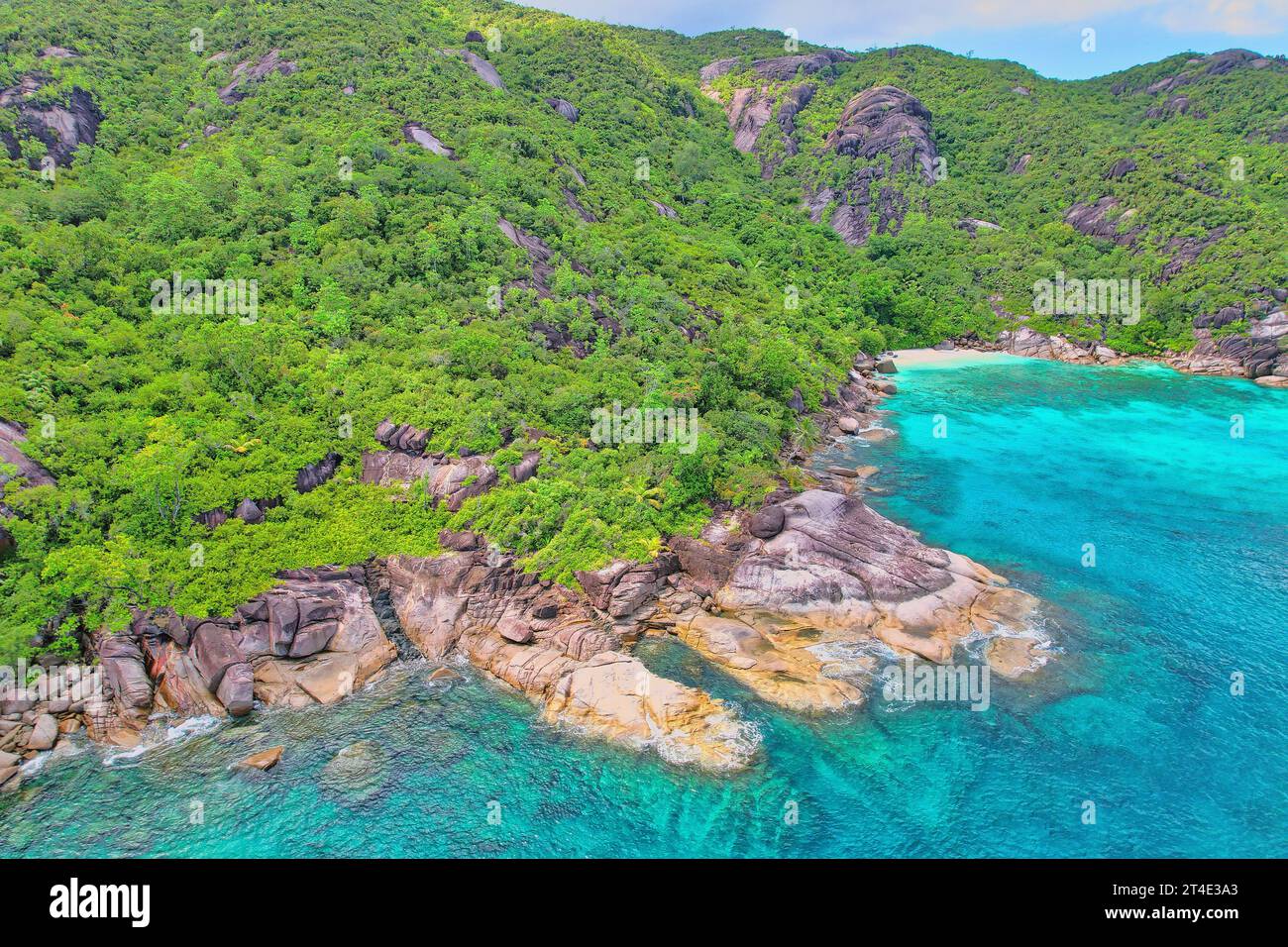 Drone shot of Anse du riz, rice beach beach, transparent sea, lush ...