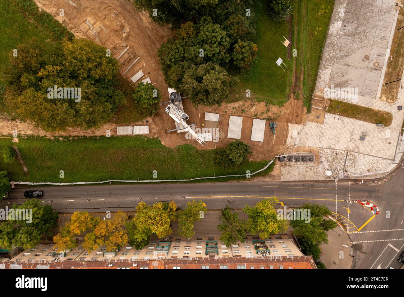 Drone photography of construction workers building staircase in a park ...