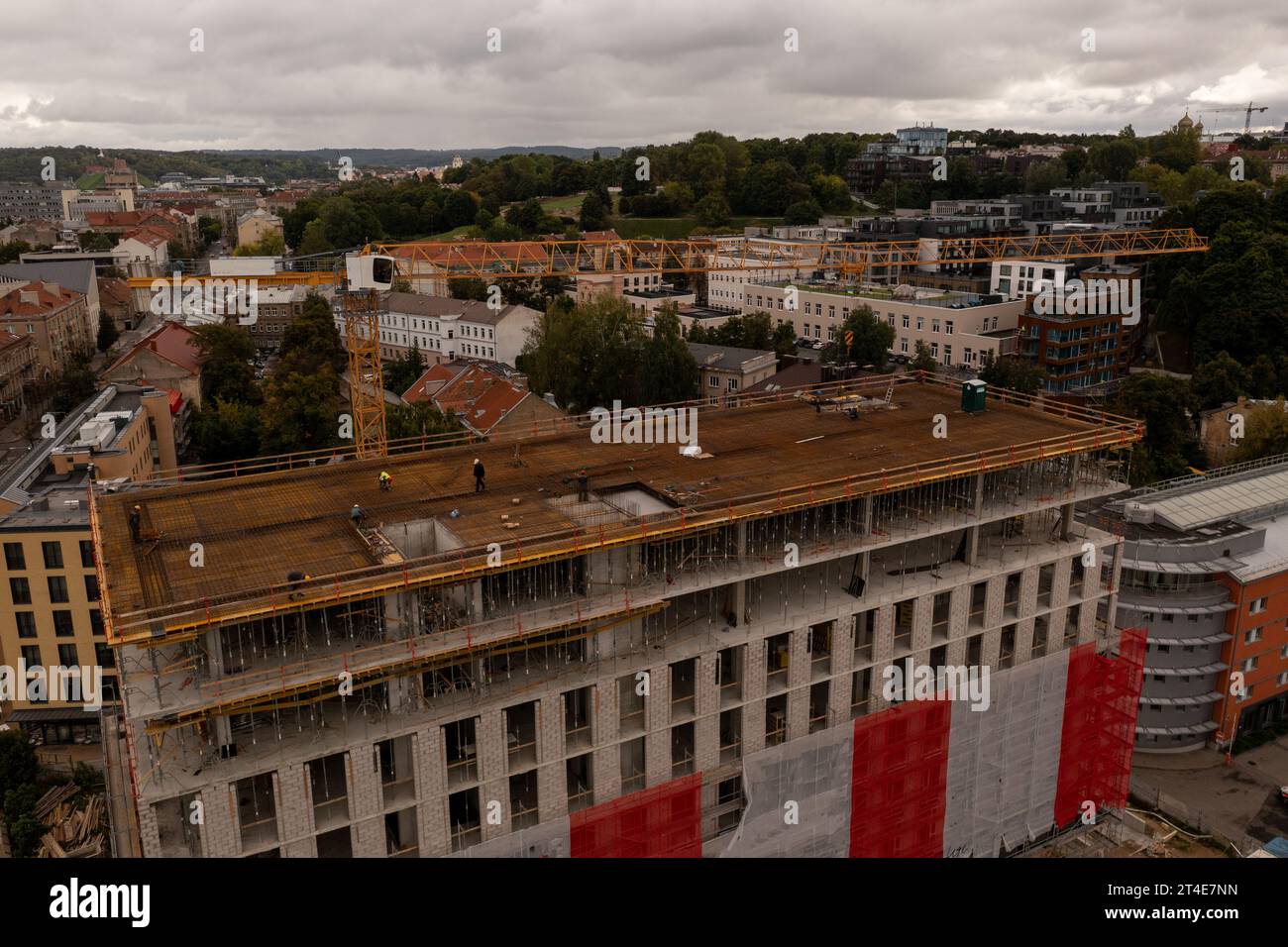 Drone photography of new building construction site, crane and ...