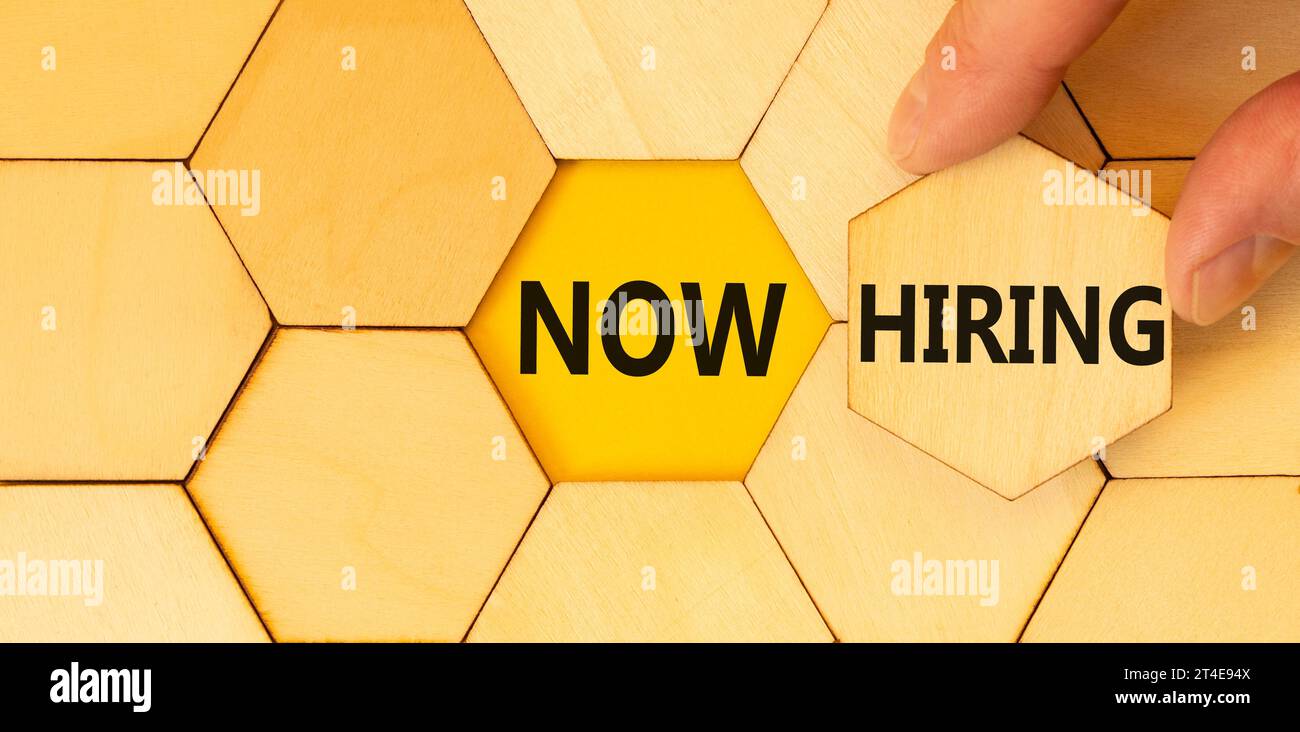 Now hiring symbol. Concept words Now hiring on beautiful wooden puzzle ...