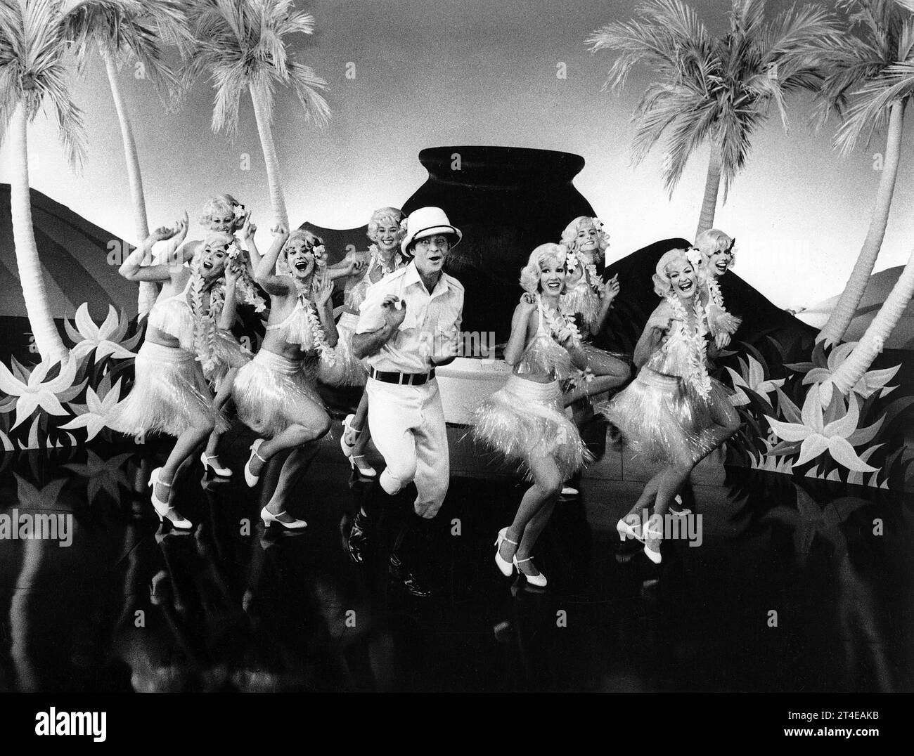 Ensemble song and dance number, on-set of the British musical film ...