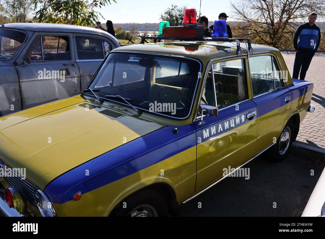 Local residents stand by the vintage car (Zhiguli) USSR period during ...