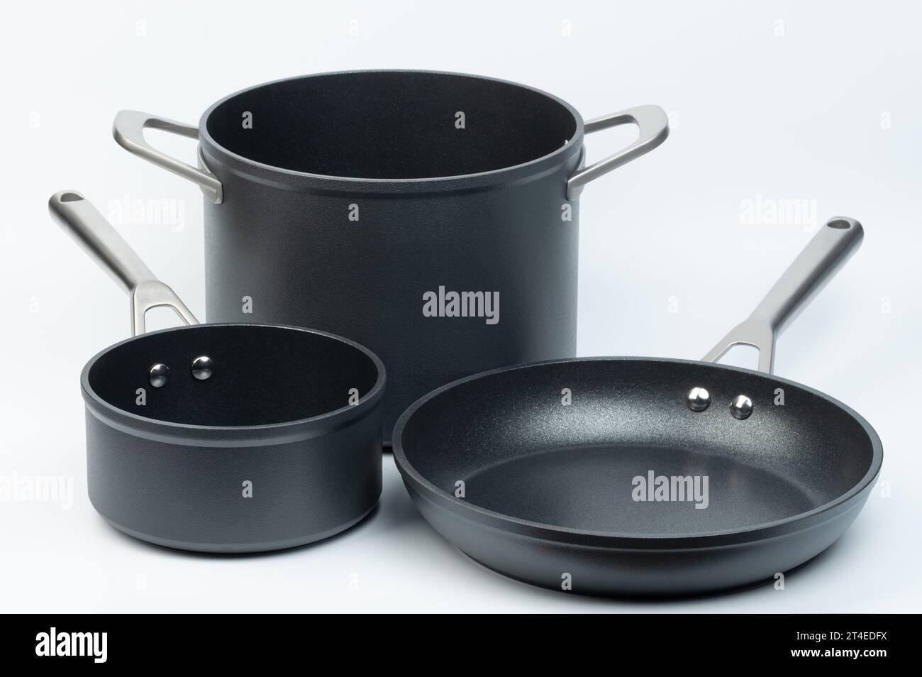 Kitchen empty pots with handles wide and tall isolated on white studio ...