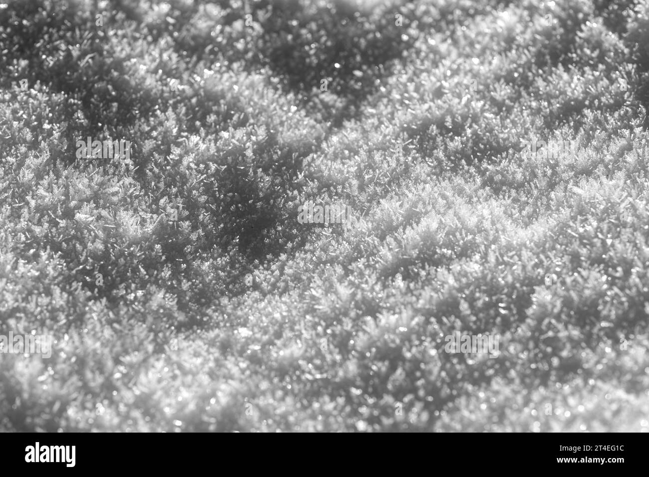 Ice crystals sparkling blue texture Black and White Stock Photos ...