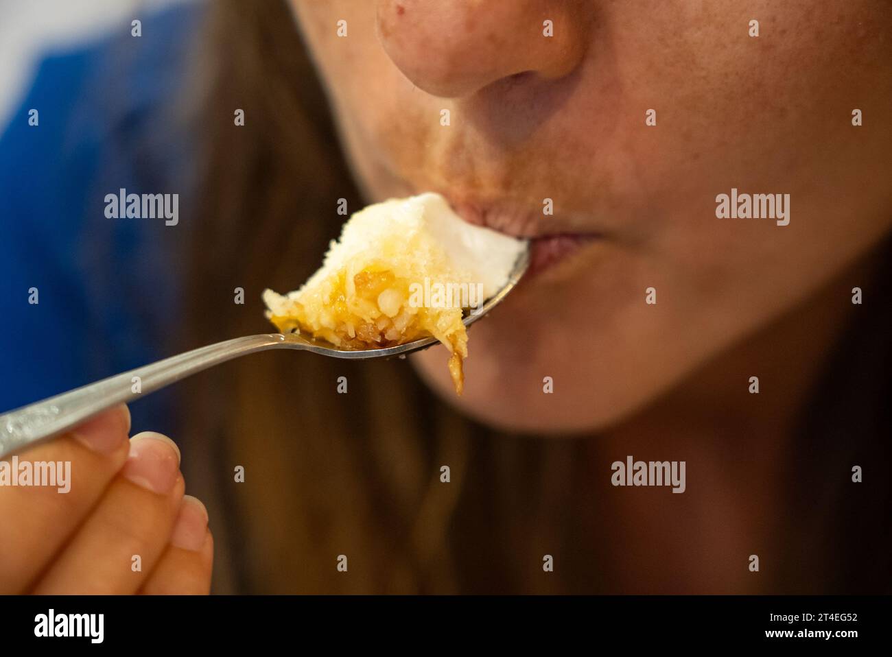 Woman eats food. Woman eats cheesecake. Close shot of girl eating cake ...
