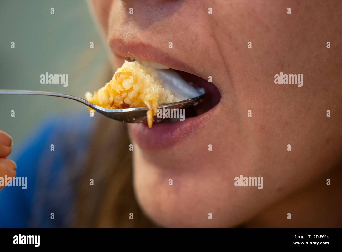 Woman eats food. Woman eats cheesecake. Close shot of girl eating cake ...