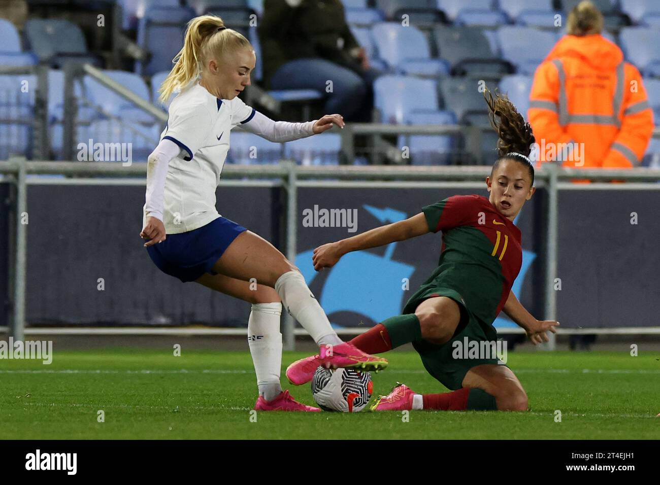 Manchester, UK. 30th Oct, 2023. Serena Queiros of Portugal U23s tackles Laura Blindkilde Brown ...
