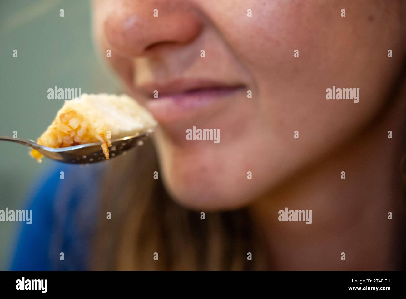 Woman eats food. Woman eats cheesecake. Close shot of girl eating cake ...