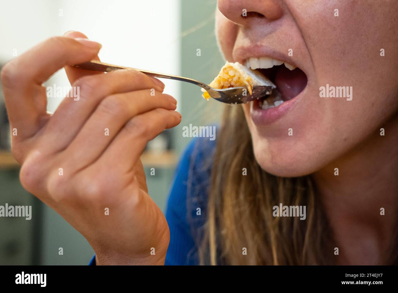 Woman eats food. Woman eats cheesecake. Close shot of girl eating cake ...