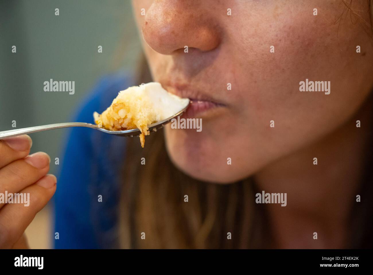 Woman eats food. Woman eats cheesecake. Close shot of girl eating cake ...