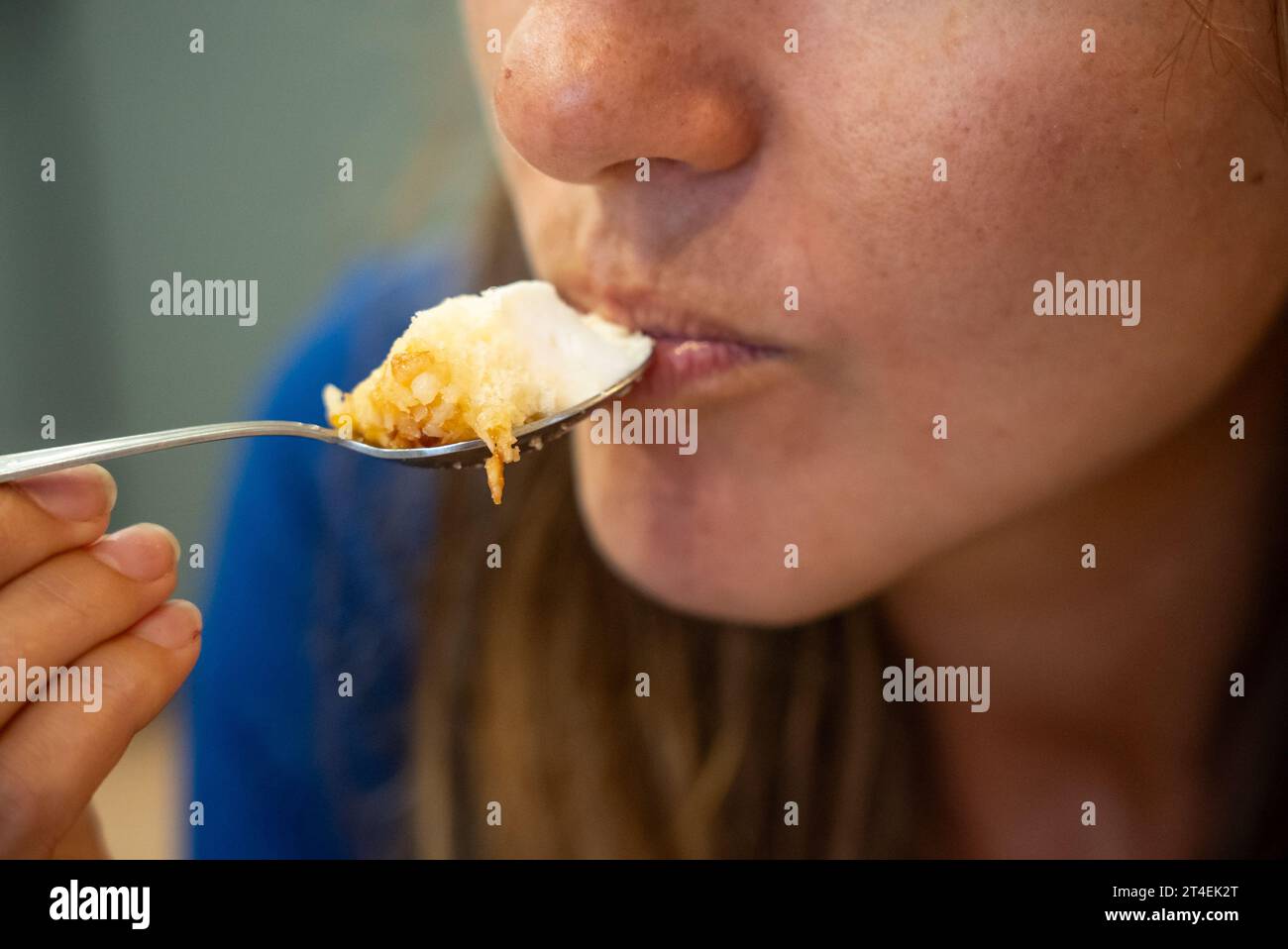 Woman eats food. Woman eats cheesecake. Close shot of girl eating cake ...