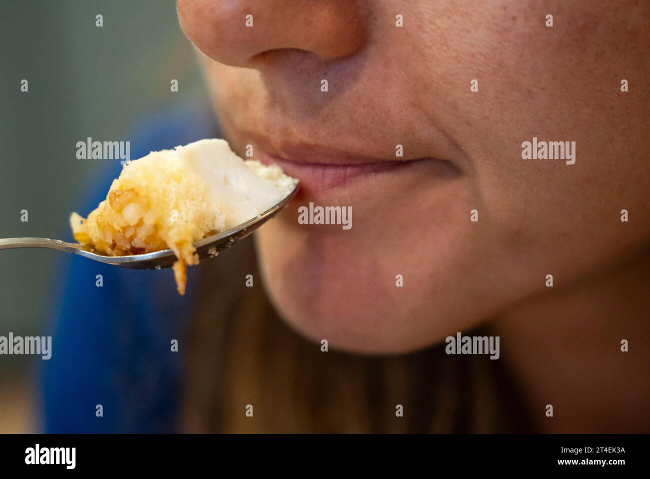 Woman eats food. Woman eats cheesecake. Close shot of girl eating cake ...