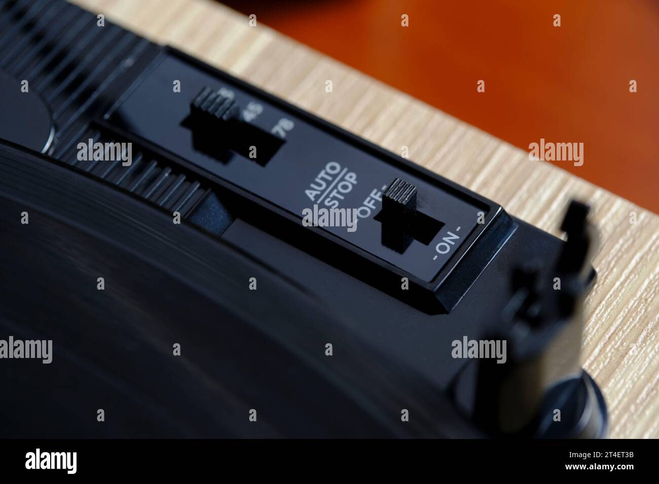 Buttons for turning on and off and switching playback speed on vinyl ...